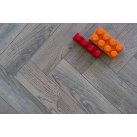Cosmo Grey Herringbone Laminate Flooring 12mm By 101mm By 606mm at Wood ...